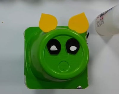 Make toys from baby milk cartons